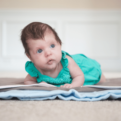 Show me milestones for a 2-month-old baby.