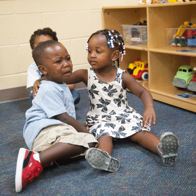 Show me milestones for a 2-year-old child.