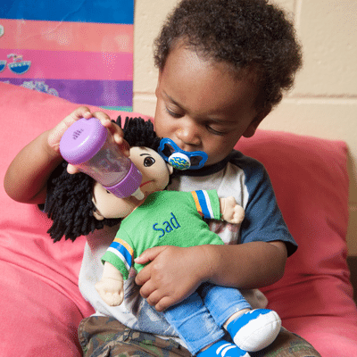 Show me milestones for an 18-month-old child.